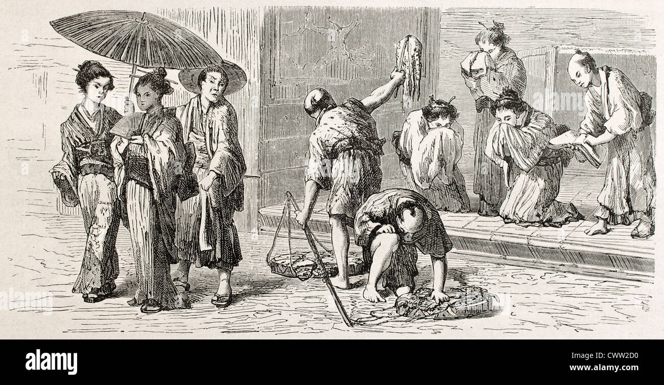 Japanese merchant selling octopus Stock Photo - Alamy