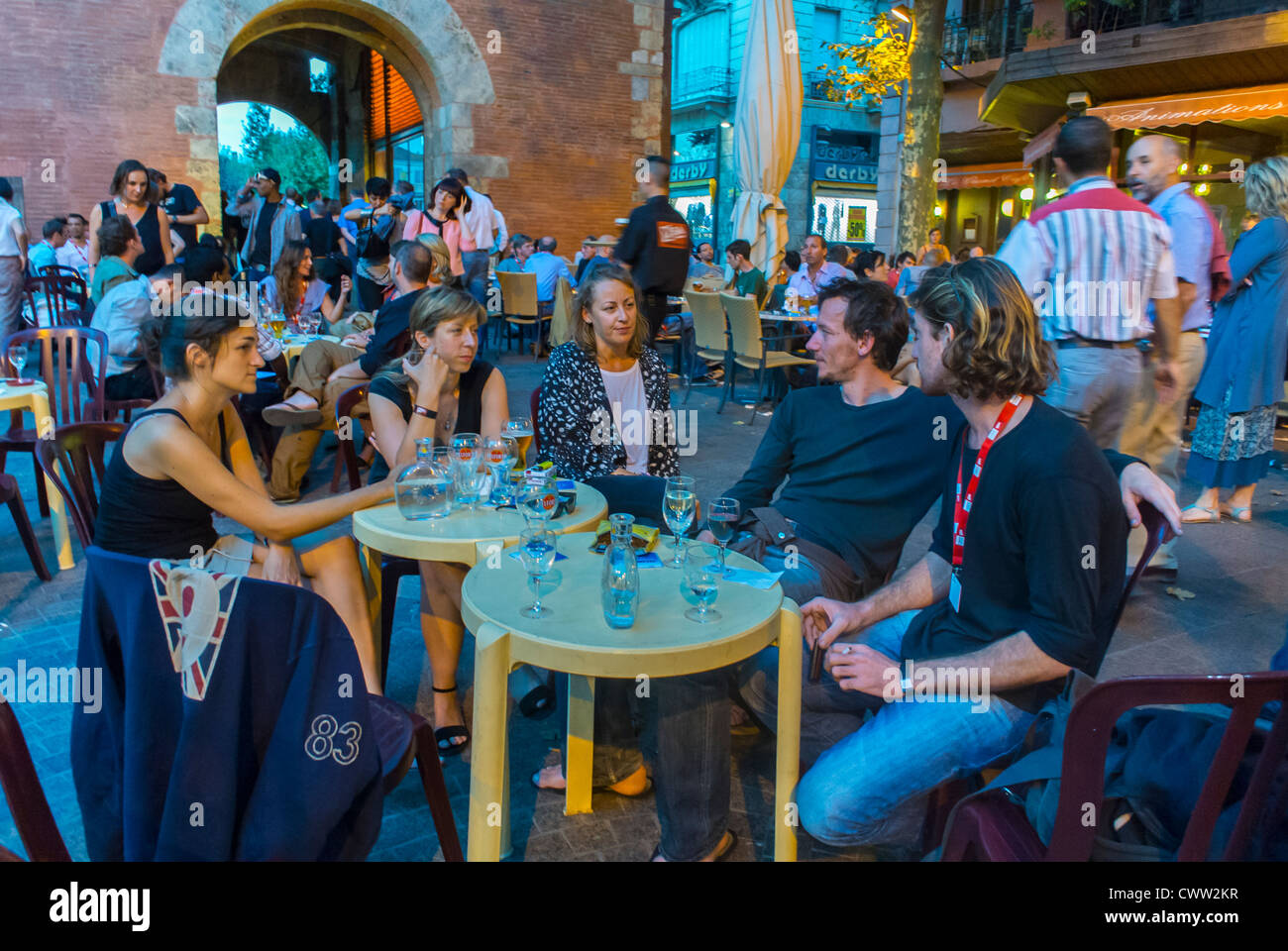 Perpignan, France, Large Crowd People, Drinking, Sharing drinks in ...