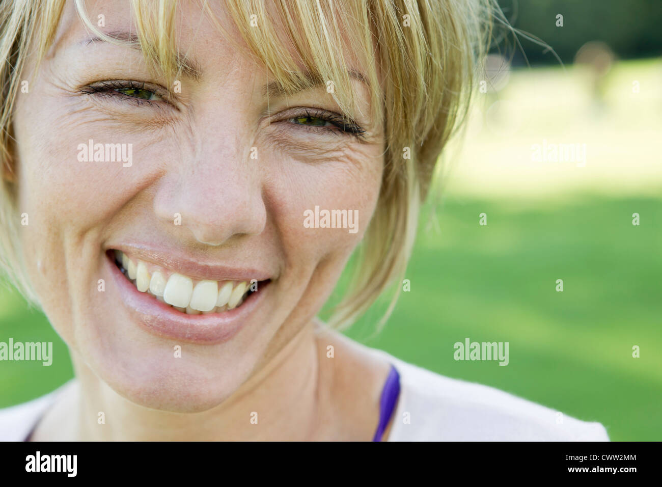Close up of womans smiling face Stock Photo - Alamy