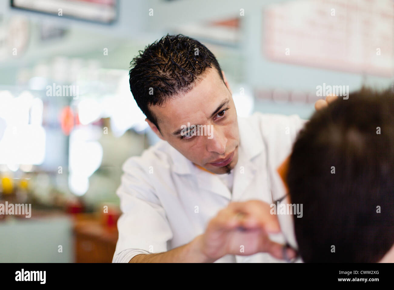 Black male barber working client hi-res stock photography and images ...