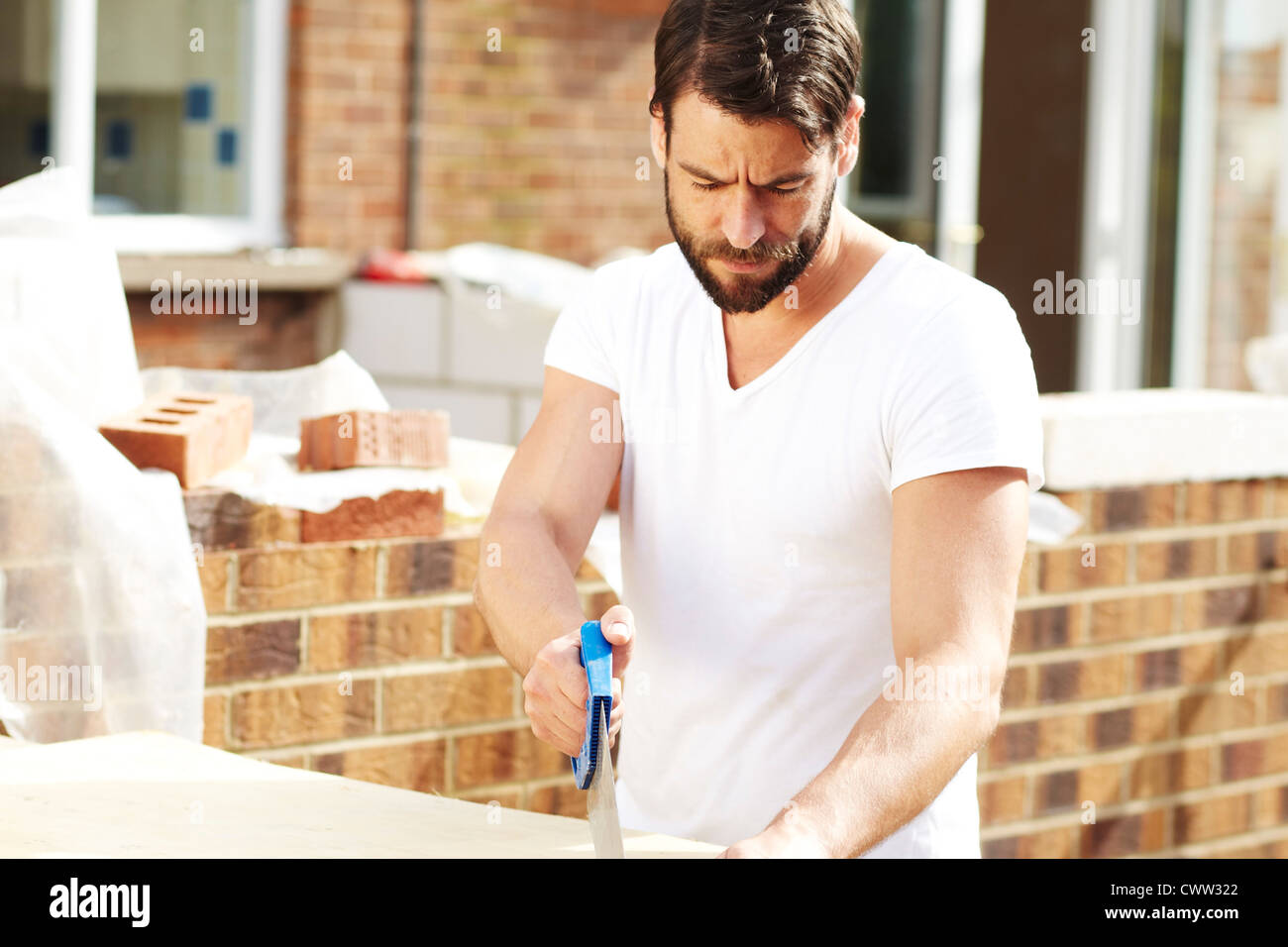 Builder at work Stock Photo - Alamy