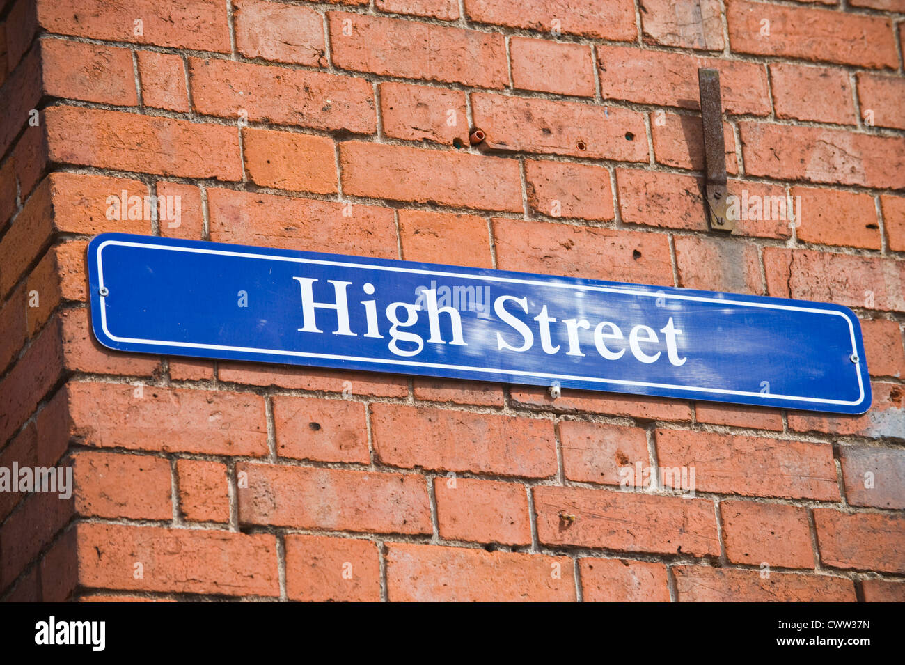 High Street sign attached to old red brick wall of building Bromyard ...