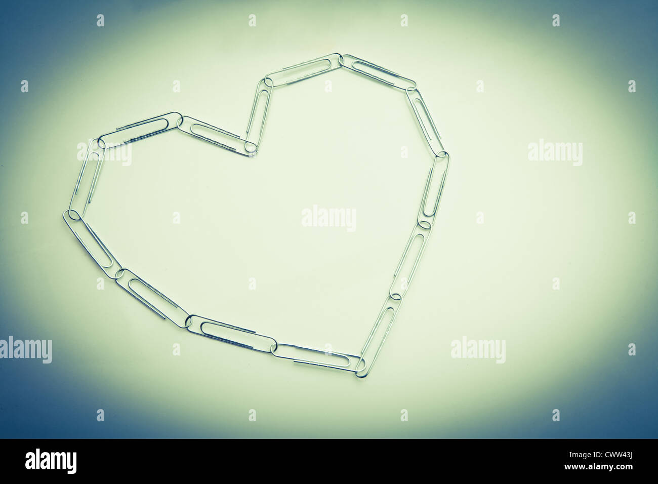 Heart made of paper clips Stock Photo - Alamy