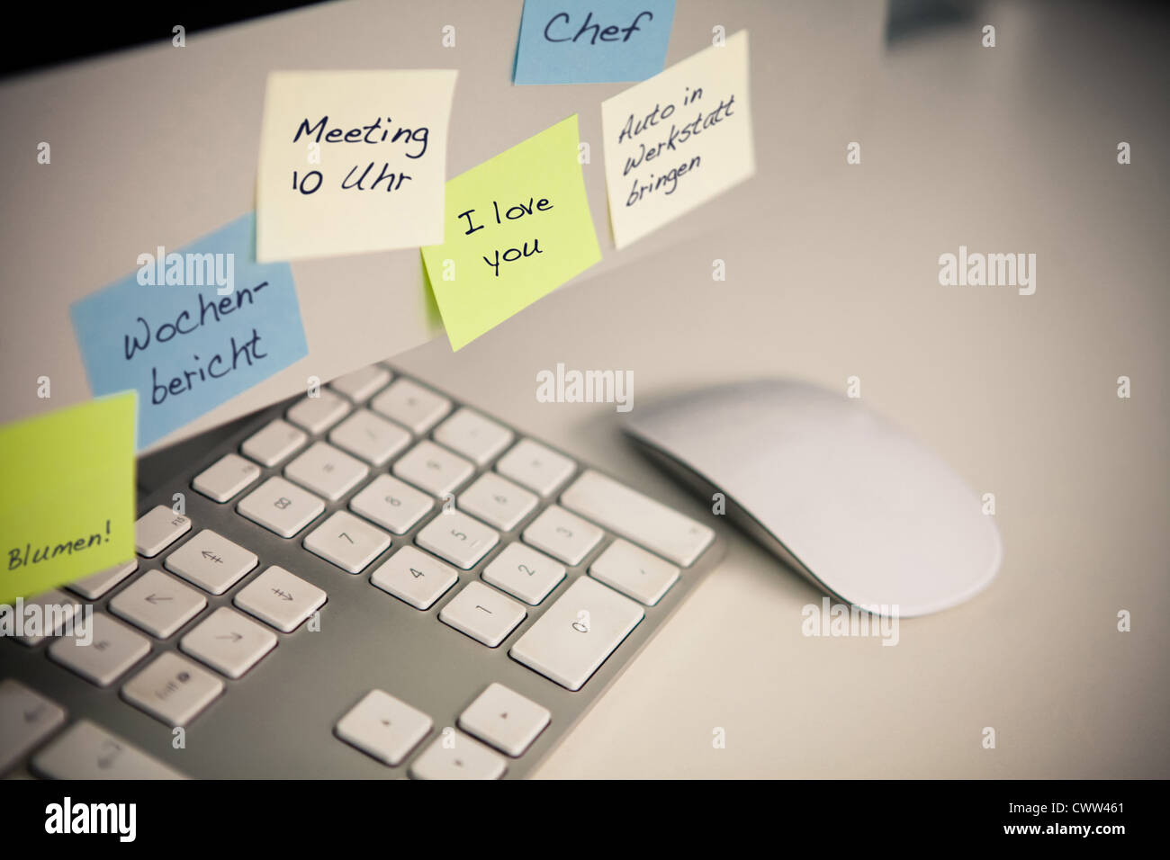 Adhesive notes at computer monitor Stock Photo - Alamy