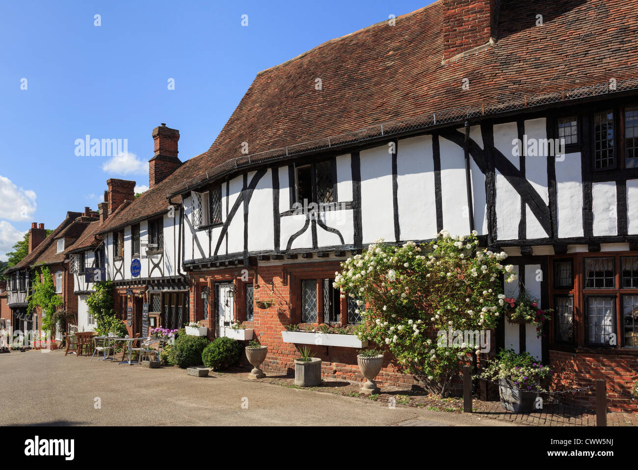 Row of timber-framed Tudor houses in pretty picturesque medieval ...
