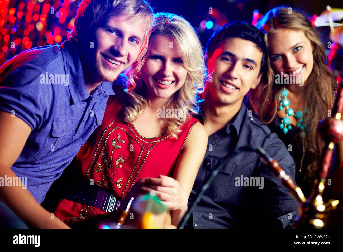 Image of two happy couples having party Stock Photo - Alamy