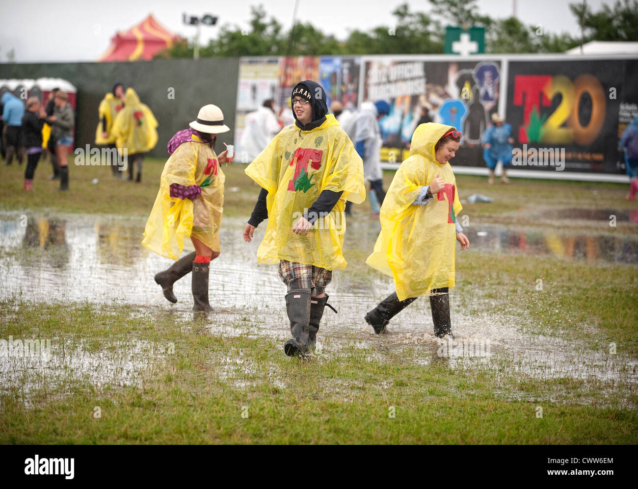 Music fans brave the mud and the rain at the main stage during T In The ...