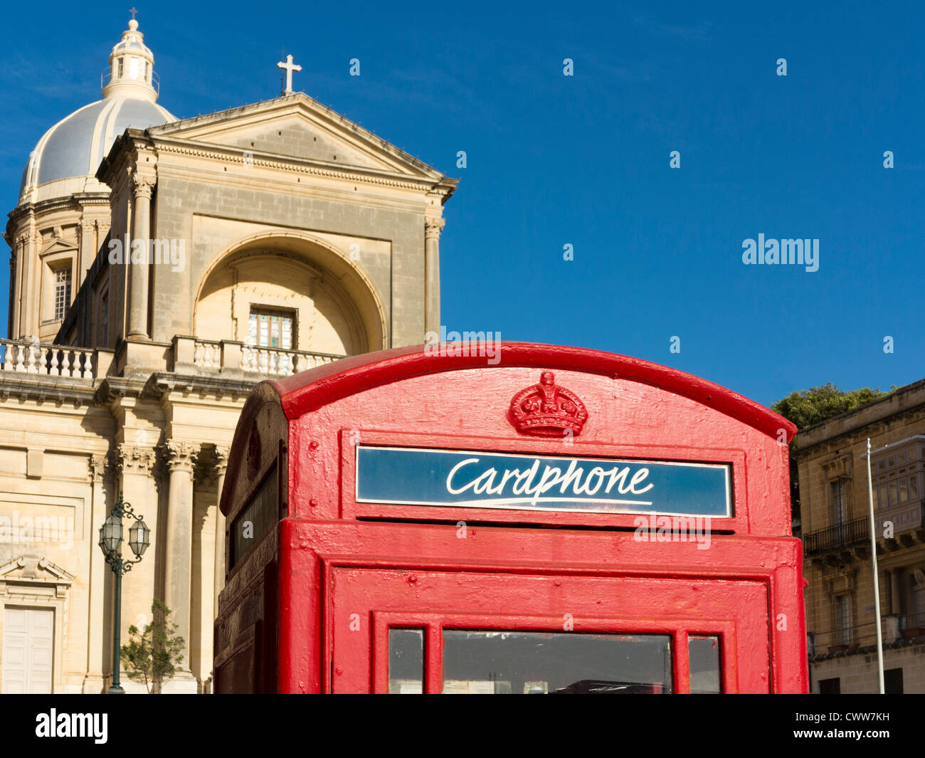 Phone box in front of the Parish church of St Joseph, Kalkara, Island ...