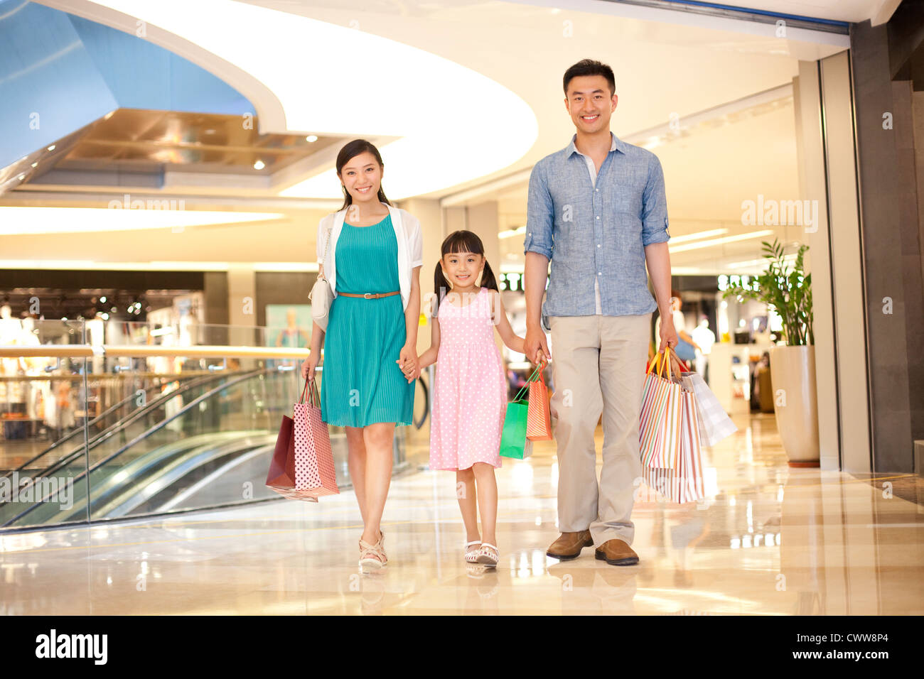 Family shopping in department store Stock Photo - Alamy