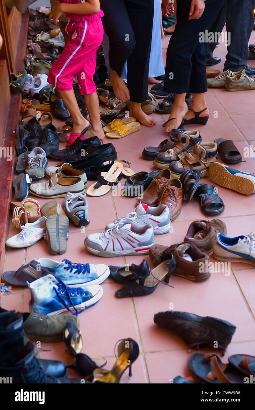 Shoes removed for entry into the temple Stock Photo - Alamy