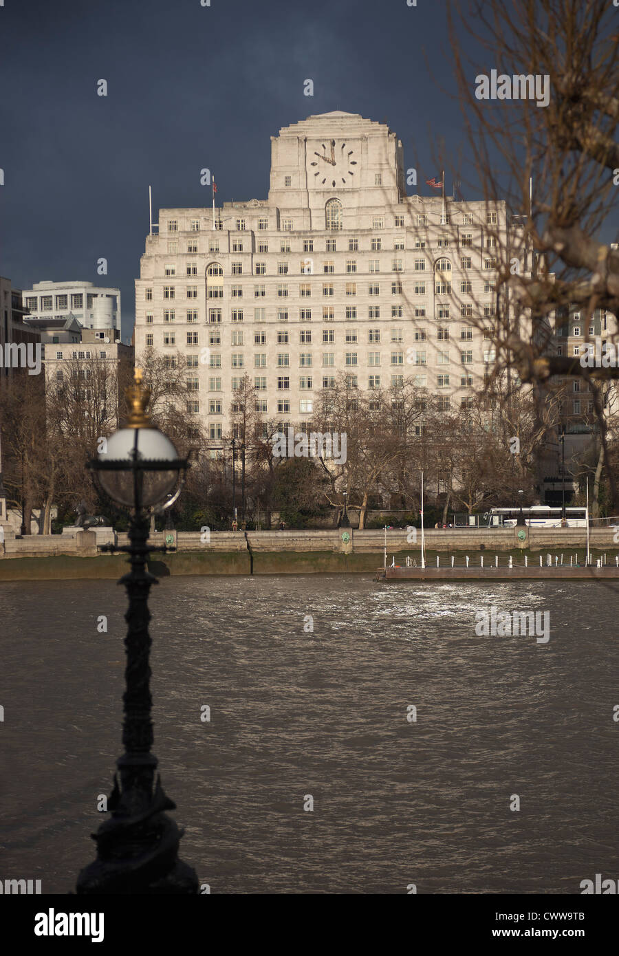 The Shell Mex Building under a dark sky. River Thames, London Stock ...