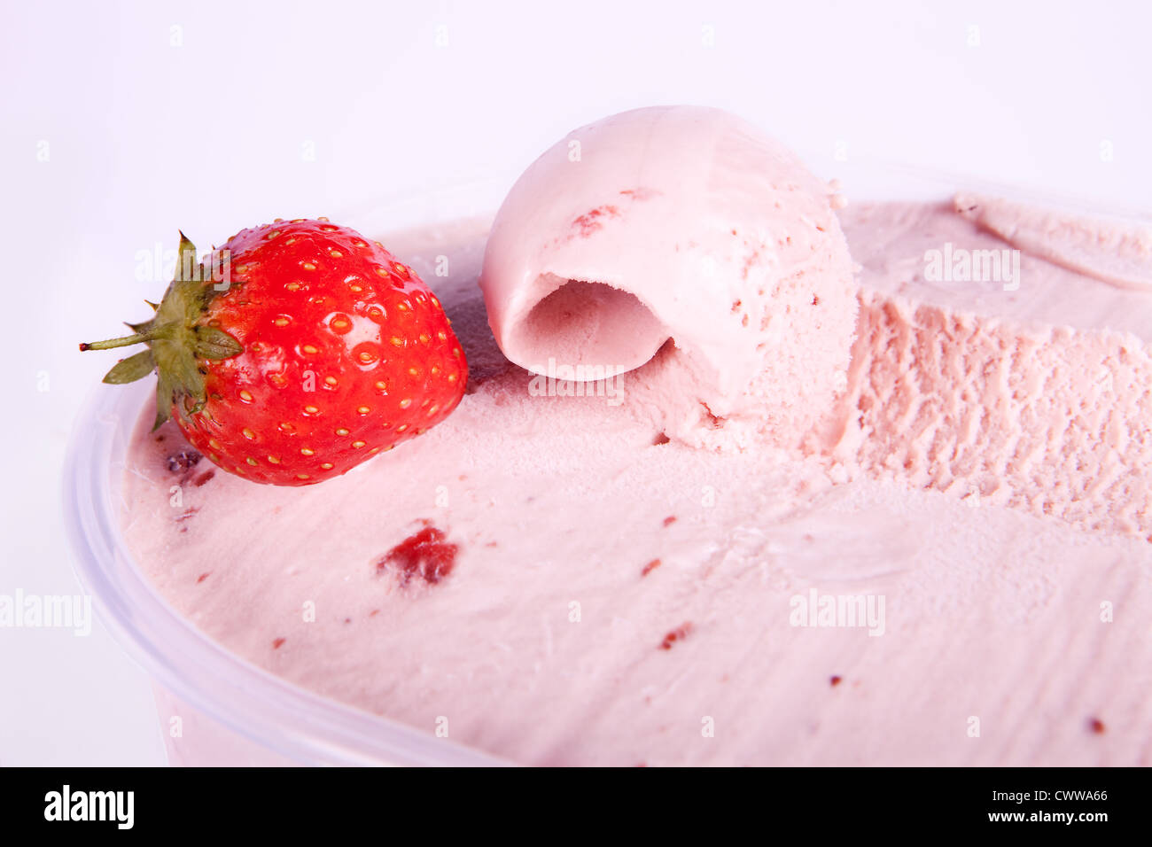 Homemade strawberry ice cream and one nice curl Stock Photo - Alamy