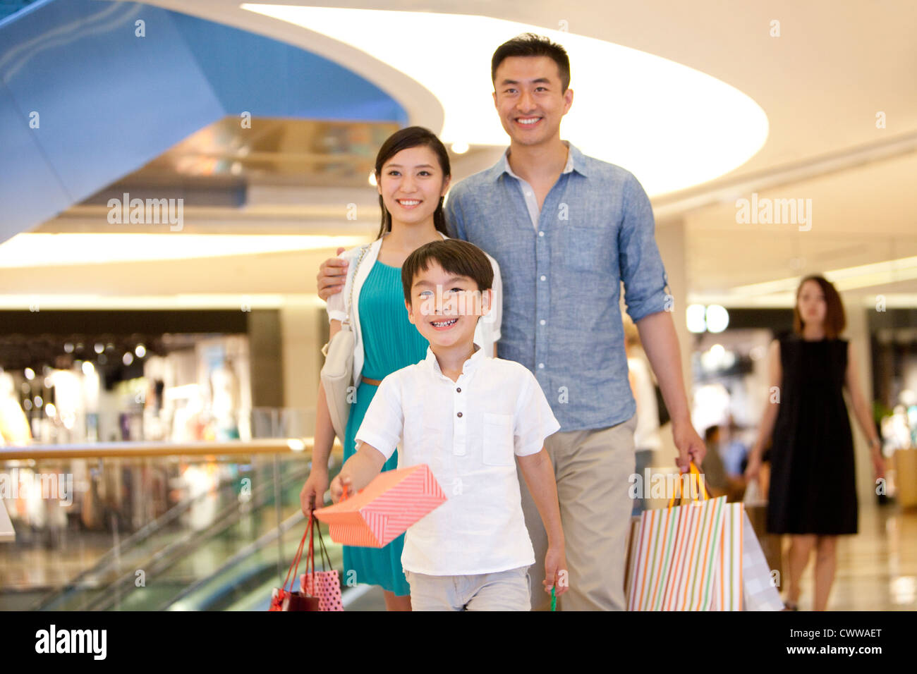 Family shopping in department store Stock Photo - Alamy