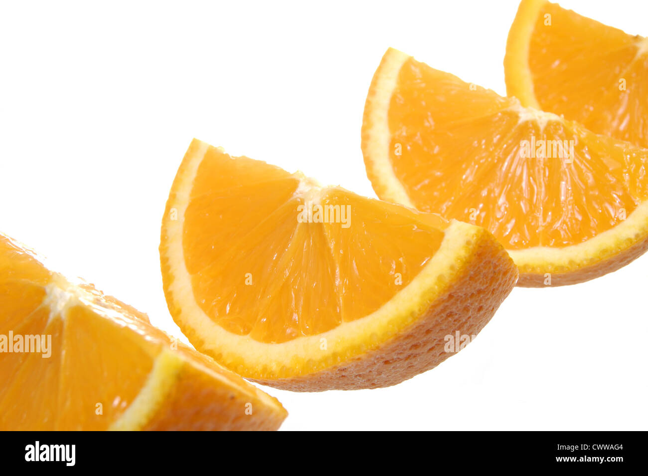 Orange quarters isolated on a white background Stock Photo - Alamy
