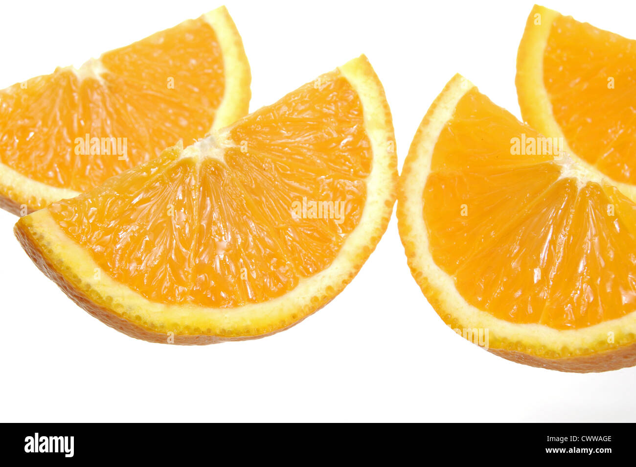 Orange quarters isolated on a white background Stock Photo - Alamy