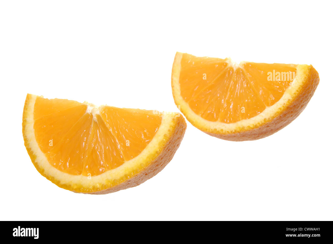 Orange quarters isolated on a white background Stock Photo - Alamy