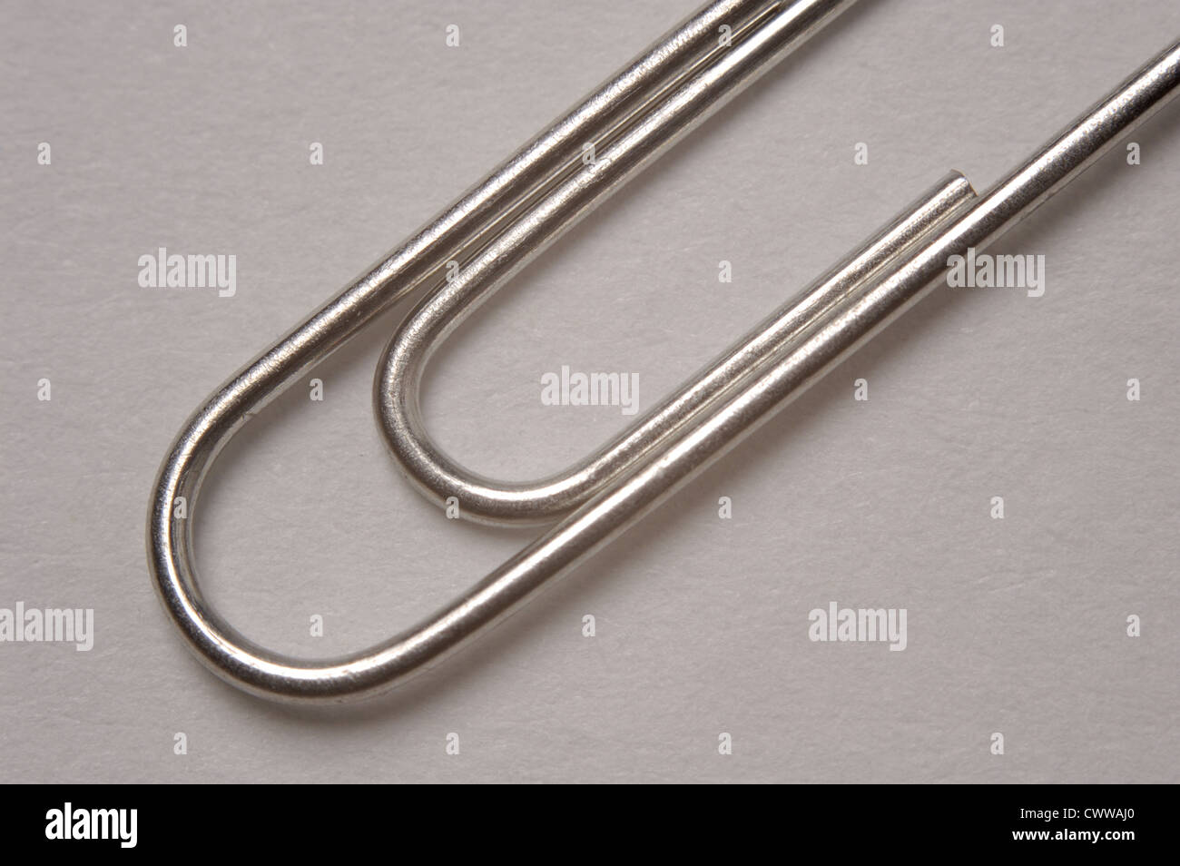 Close up of paper clip and paper texture Stock Photo - Alamy