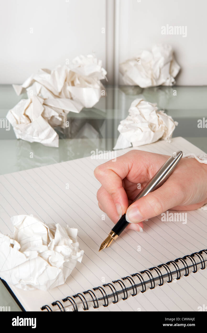 Writer surrounded by paper hi-res stock photography and images - Alamy