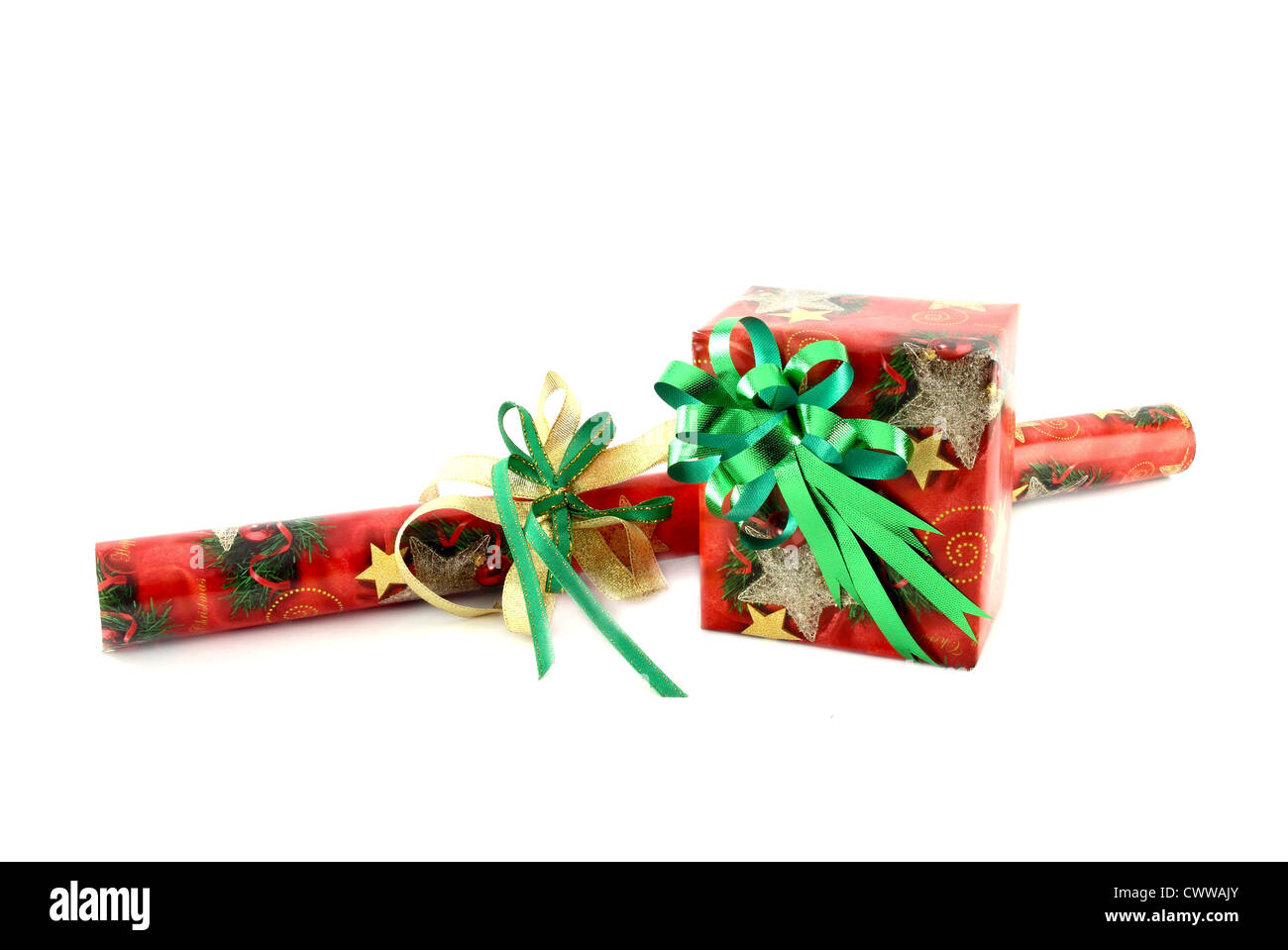 gift box with roll of paper on white background Stock Photo - Alamy