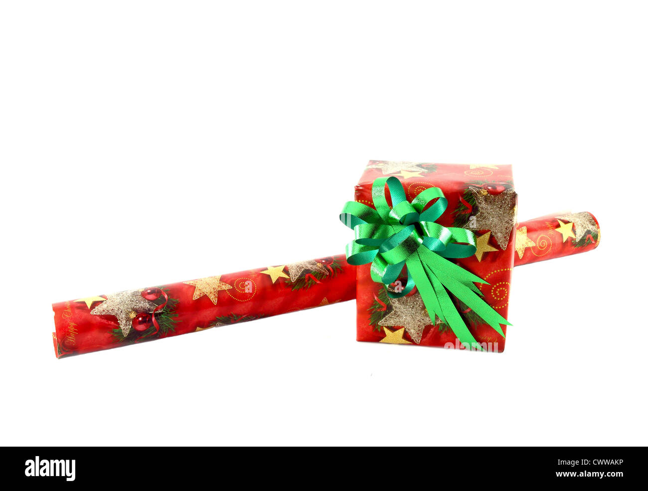 gift box with roll of paper on white background Stock Photo - Alamy