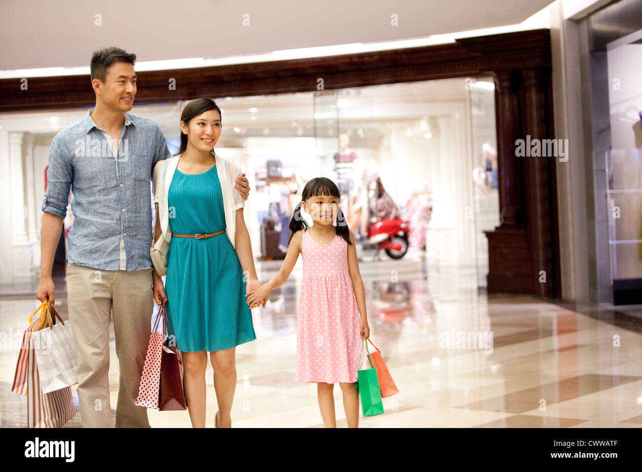 Family shopping in department store Stock Photo - Alamy