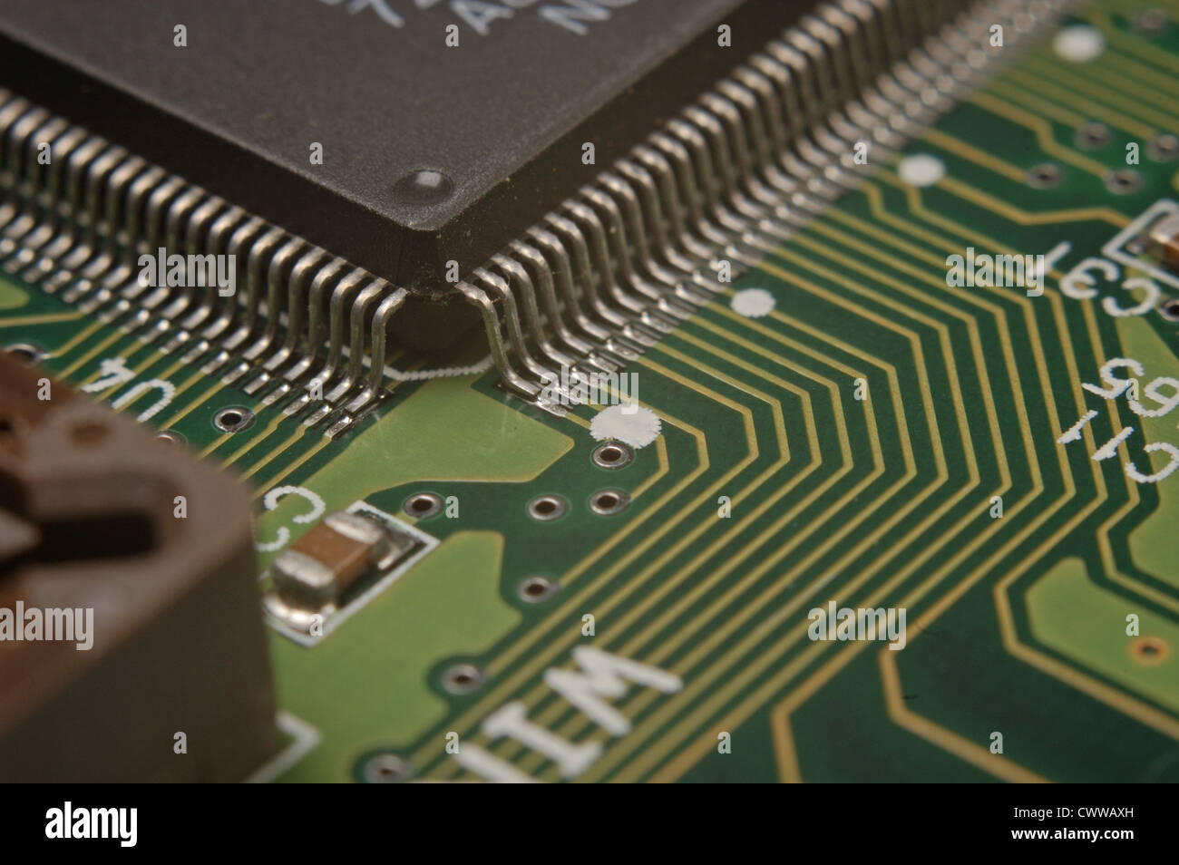 Close up view of a printed circuit board and microchips Stock Photo - Alamy