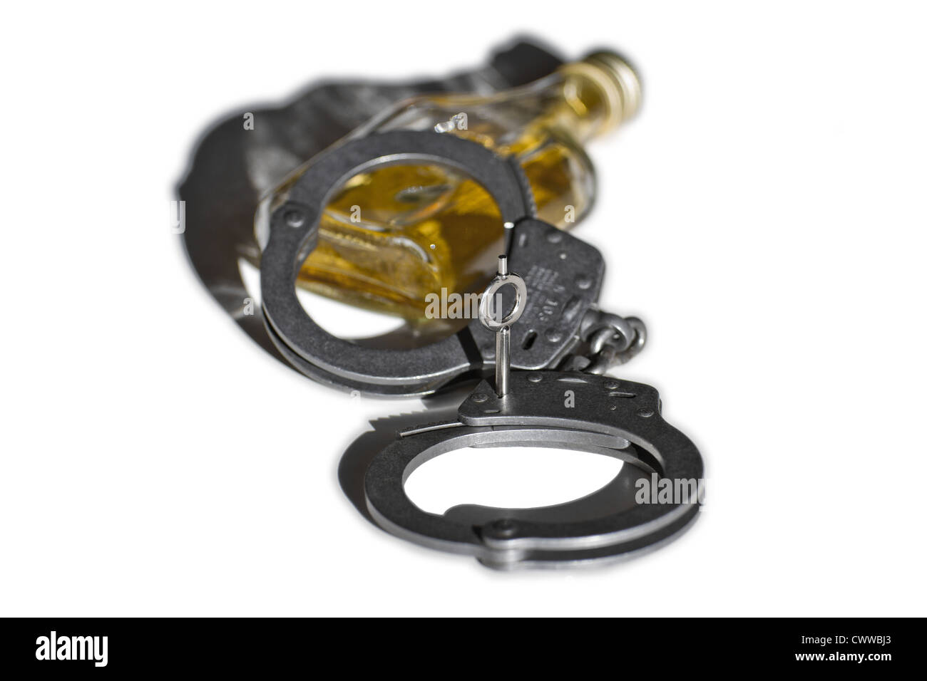 Handcuffs alcohol bottle hi-res stock photography and images - Alamy