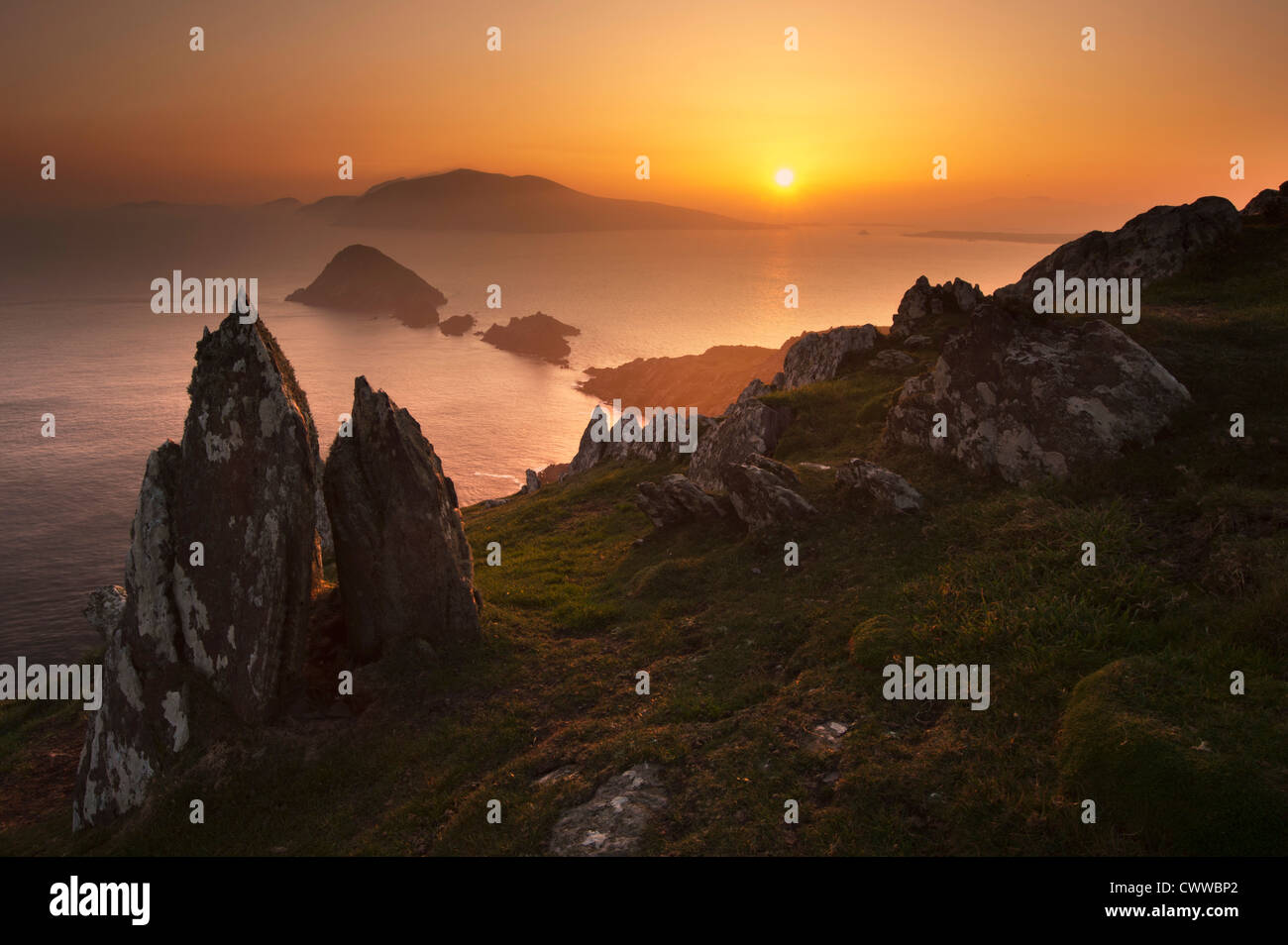 Sun setting over rural rock formations Stock Photo - Alamy