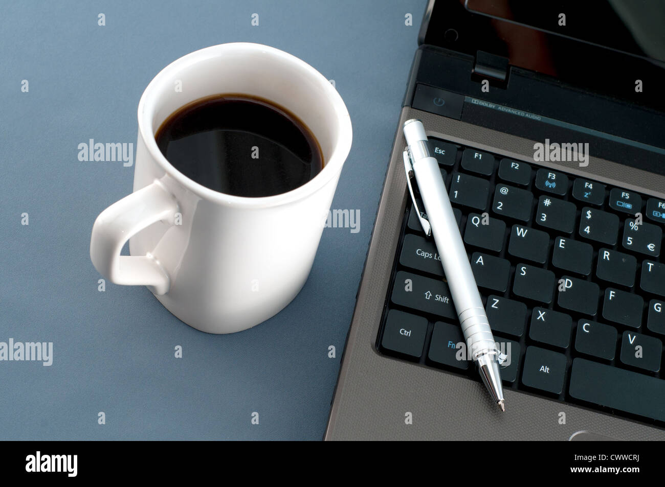 Notebook, pen and a big coffee Stock Photo - Alamy