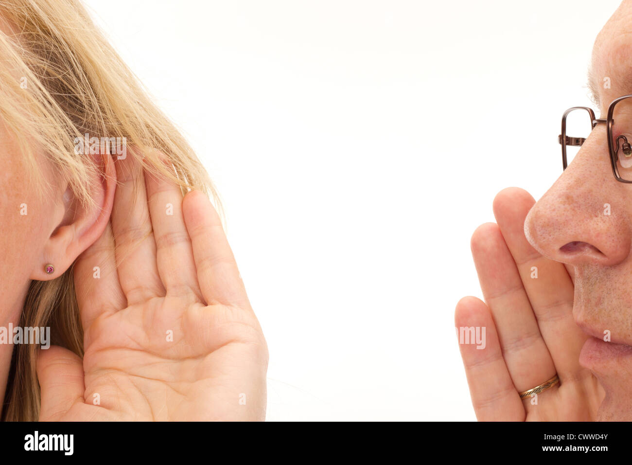 Man saying something to woman Stock Photo - Alamy