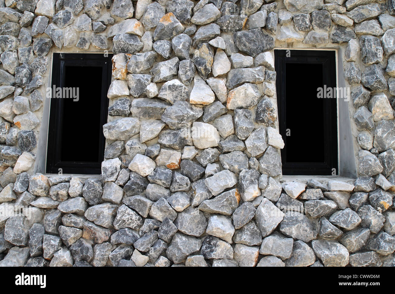 window on stone wall texture Stock Photo - Alamy