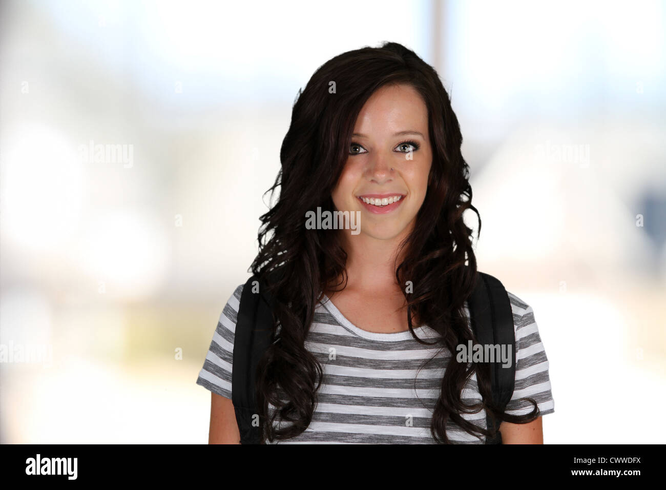 Girl wearing backpack at her school Stock Photo - Alamy