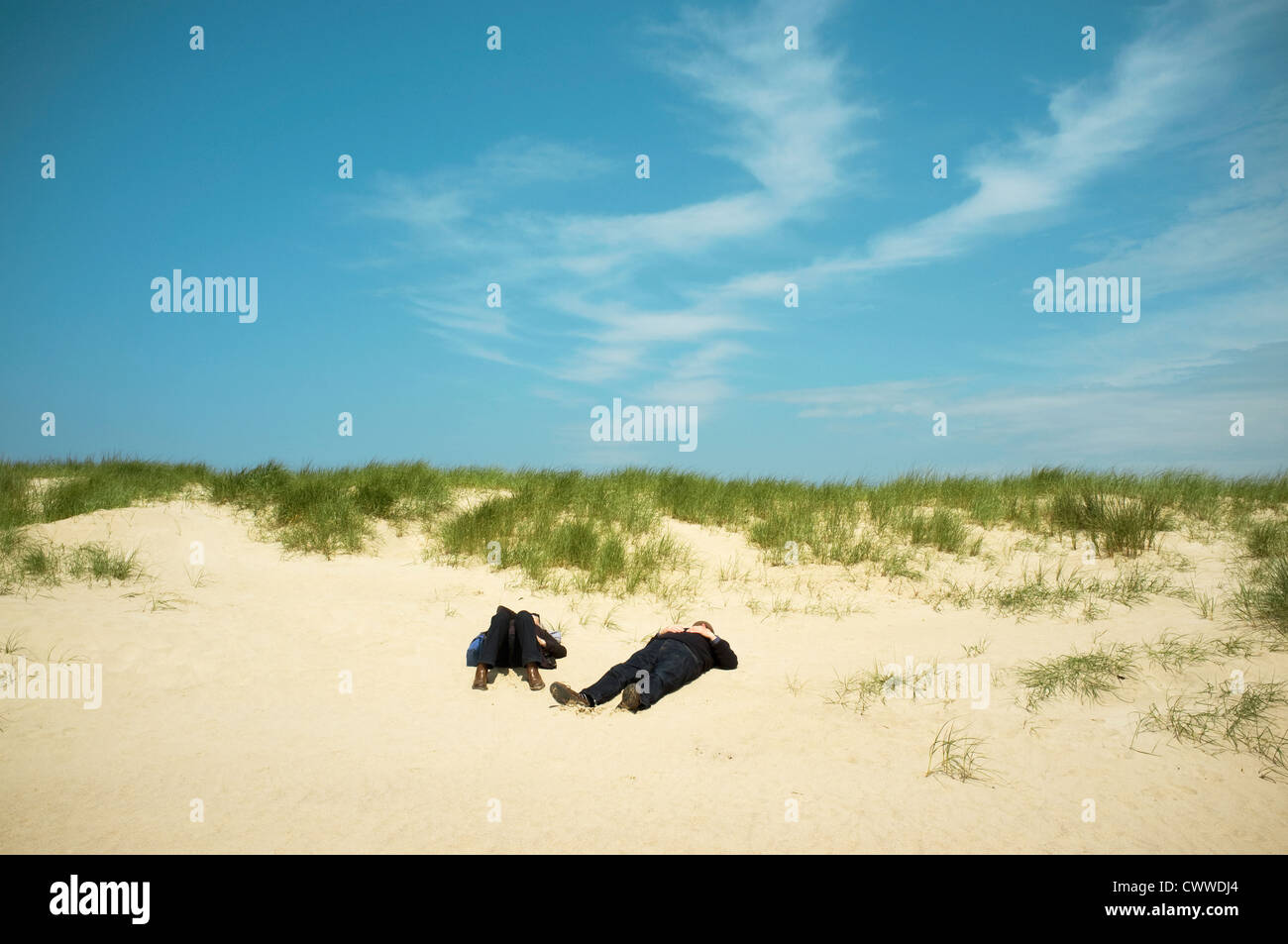 Beach fully clothed hi-res stock photography and images - Alamy