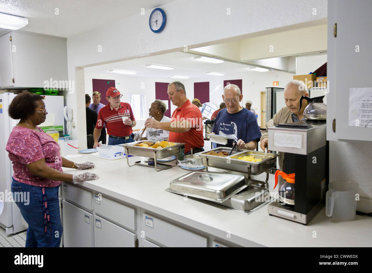 Members of Maranatha Baptist Church are served breakfast meal before a ...
