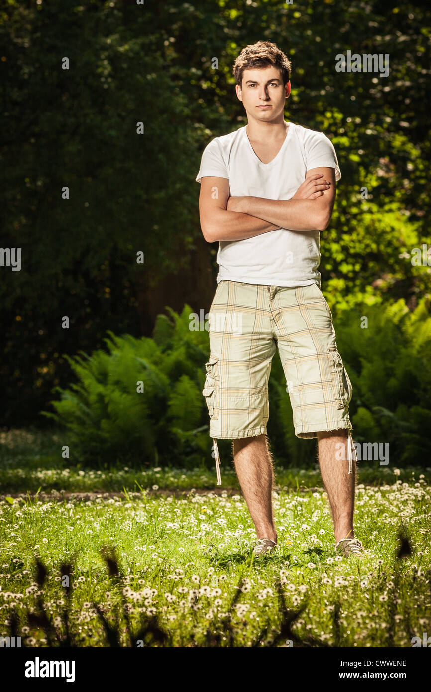 Man standing in field Stock Photo - Alamy