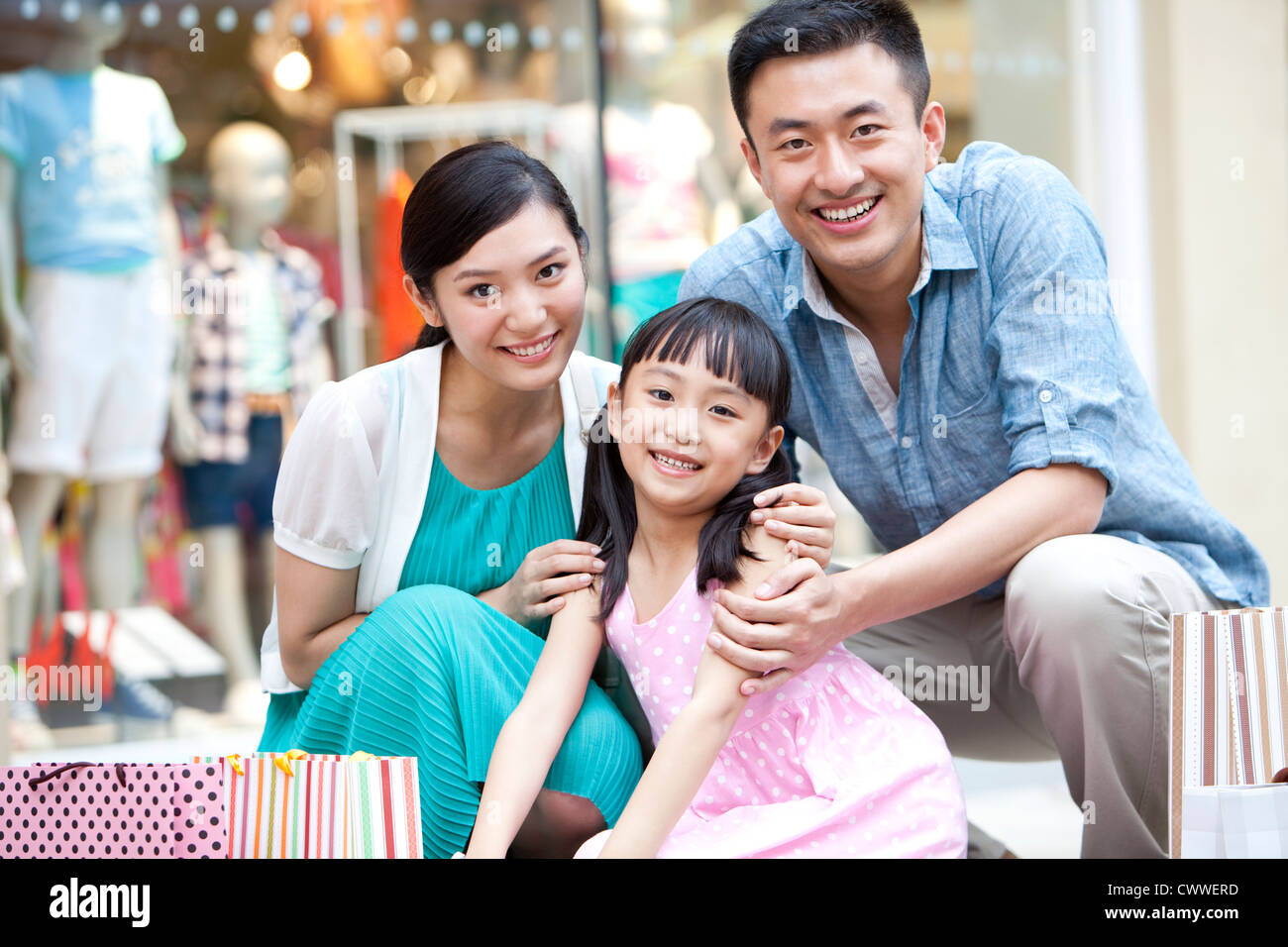 Family shopping in department store Stock Photo - Alamy
