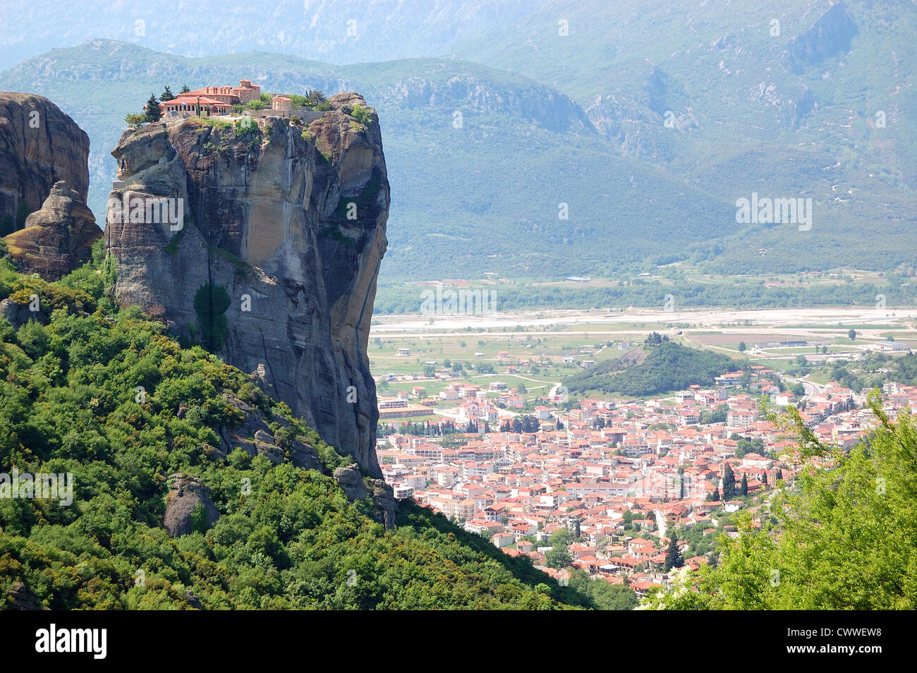 Kalampaka Town and rock with Holy Trinity Monastery on a top, Meteora ...