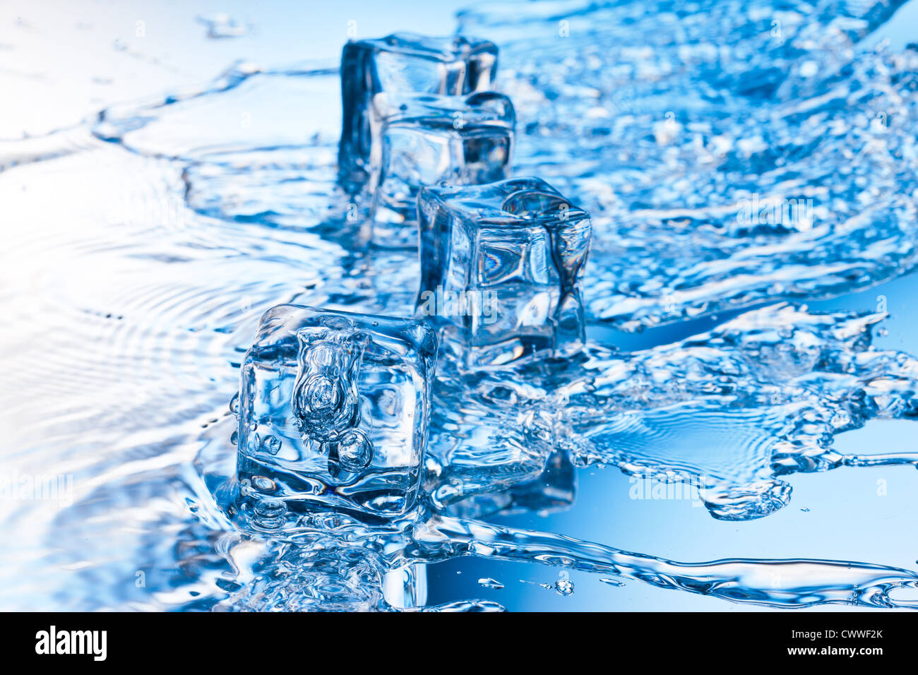 ice cube with pure water on reflective surface Stock Photo - Alamy