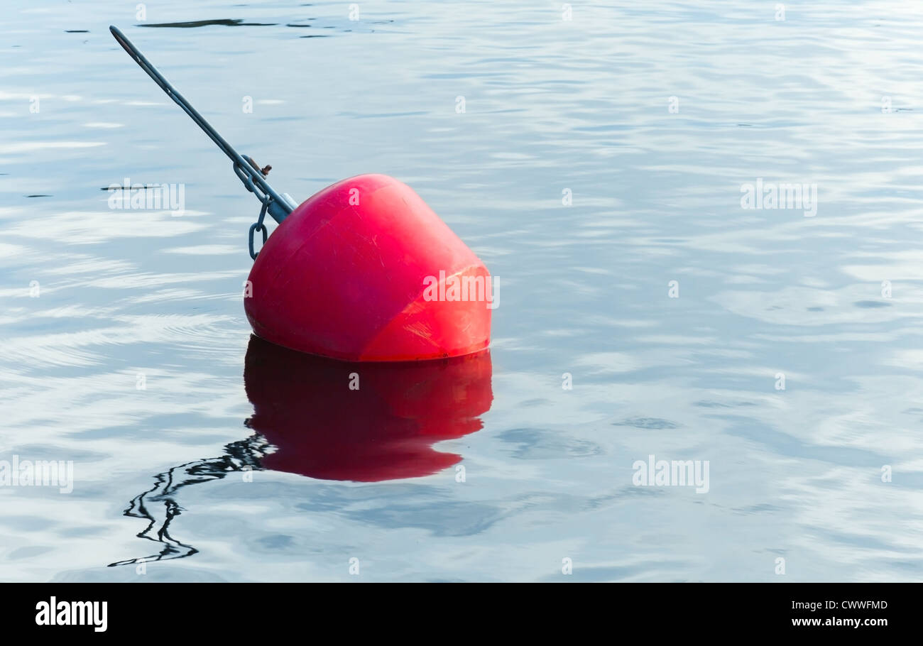 Yachts moorings red buoy of small European marina Stock Photo - Alamy