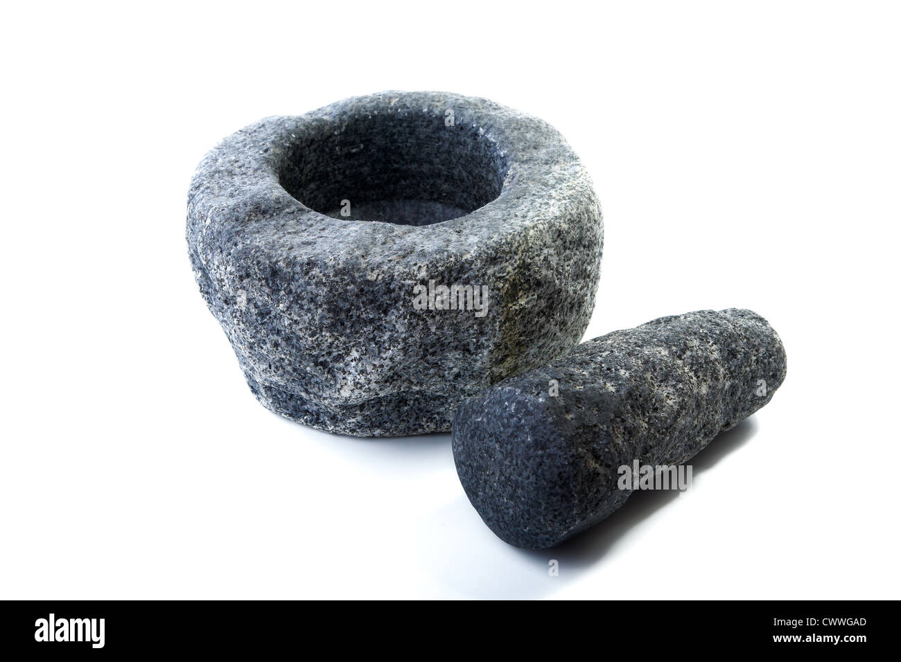Granite mortar and pestle isolated on a white background Stock Photo ...