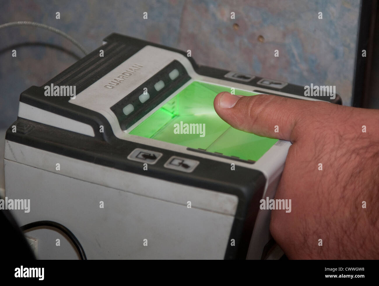 US Customs and Border Protection officer uses scanner to document and ...