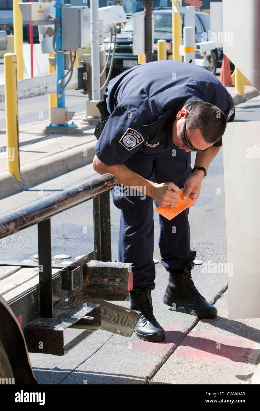 U.S Customs and Border Protection inspect cars, ask for documentation ...
