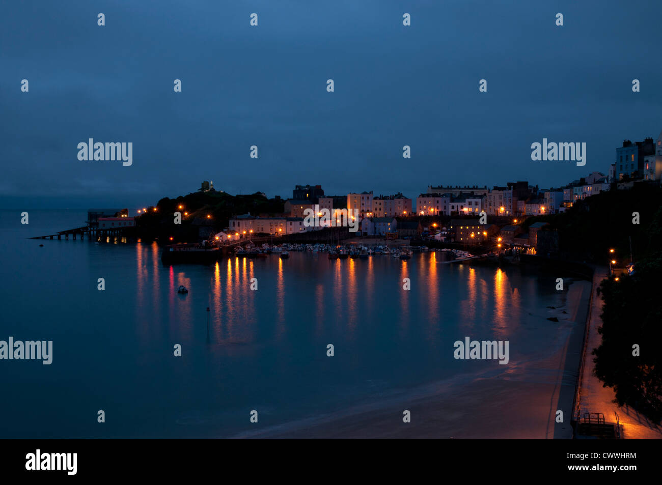 Tenby harbour by night Stock Photo - Alamy