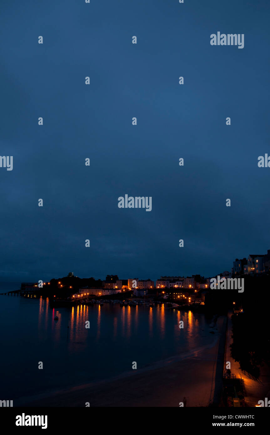 Tenby harbour by night Stock Photo - Alamy