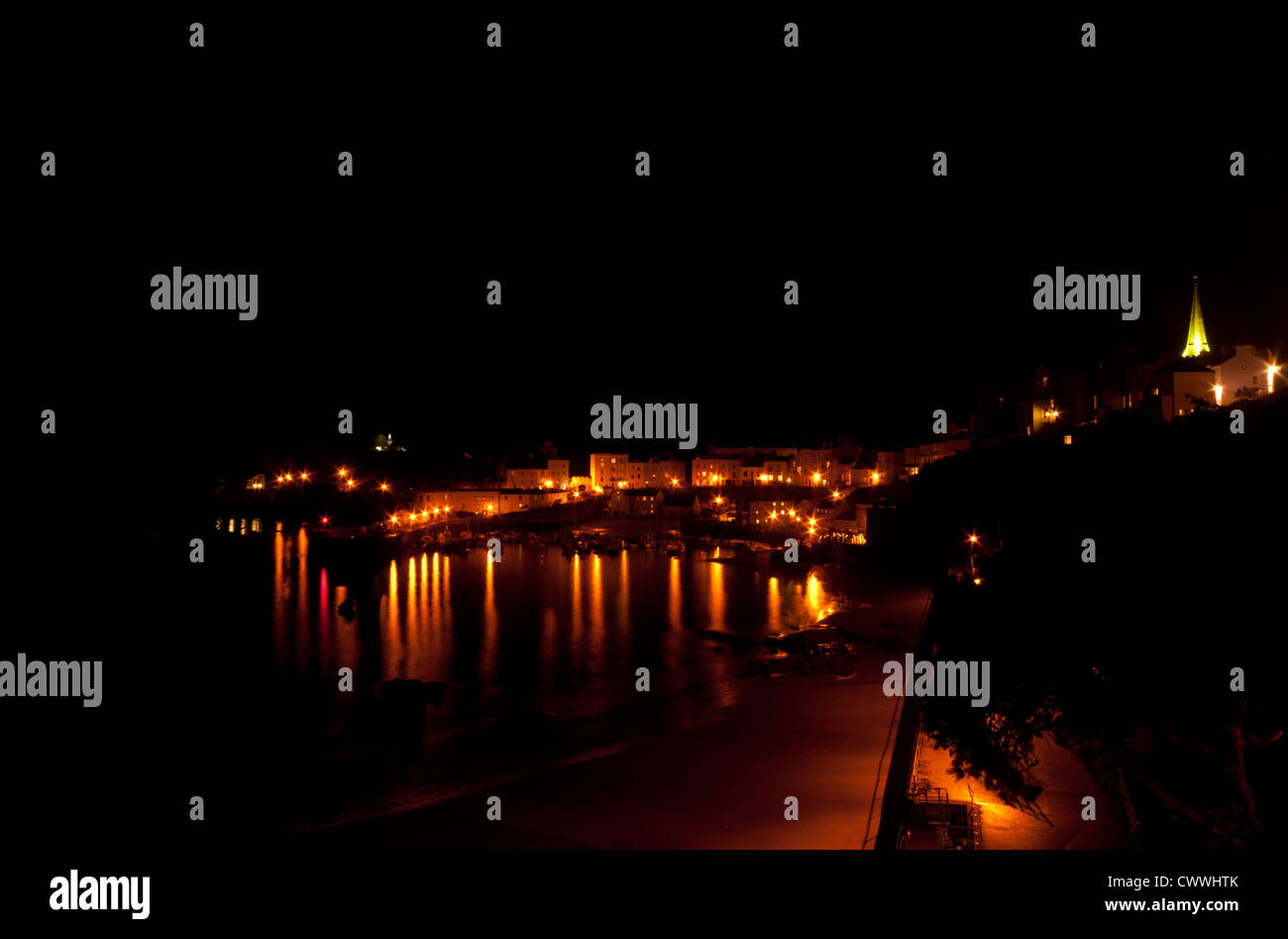 Tenby harbour by night Stock Photo - Alamy