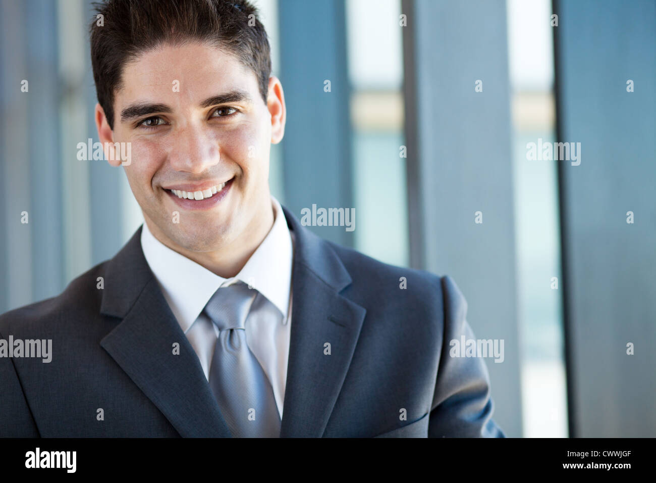 handsome businessman closeup portrait in office Stock Photo - Alamy