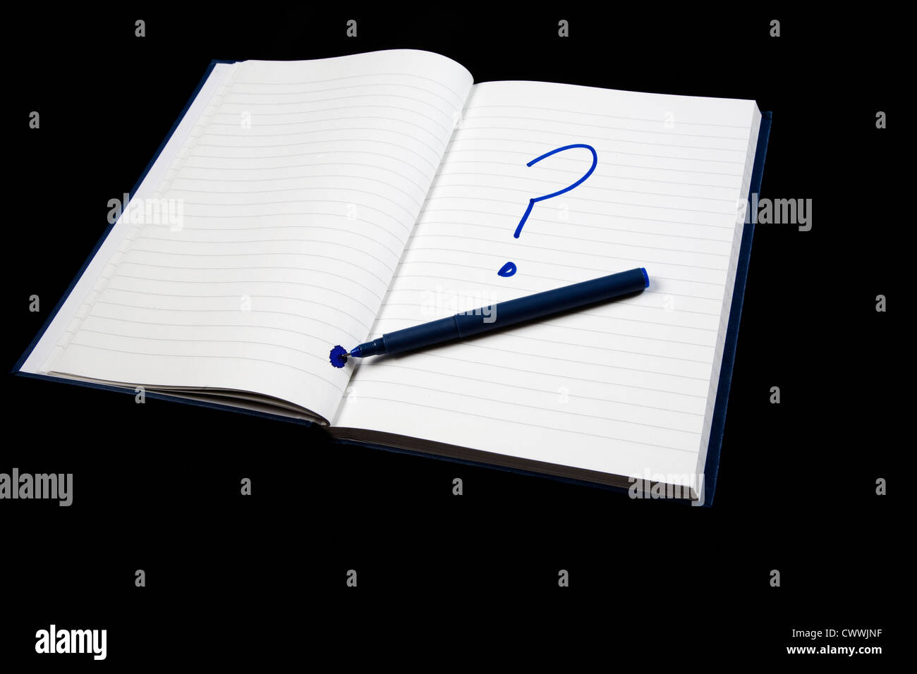 Open book with question mark drawn on paper Stock Photo - Alamy
