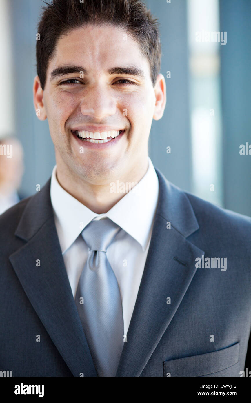 happy young businessman laughing Stock Photo - Alamy