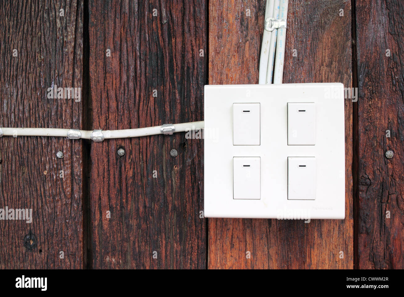 buzzer switch on wooden wall Stock Photo - Alamy