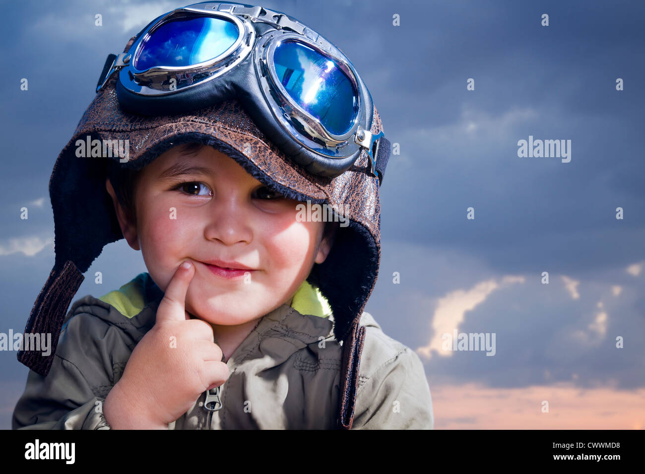 Adorable baby dressed in pilot uniform with funny face Stock Photo - Alamy